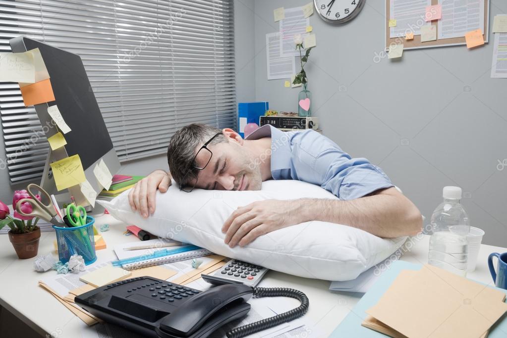 Office worker sleeping on desk — Stock Photo © stockasso #58272763