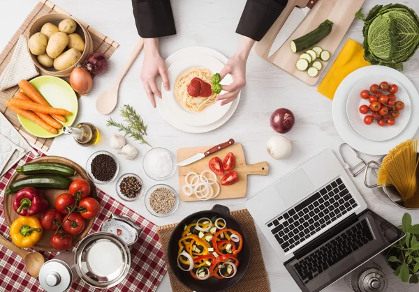 Chef at work cooking pasta — Stock Photo © stockasso #70858971