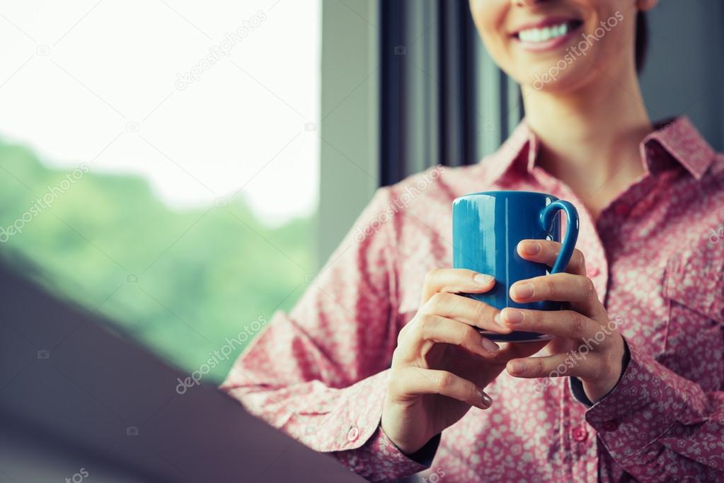 Relaxing coffee break at window — Stock Photo © stockasso #80152162