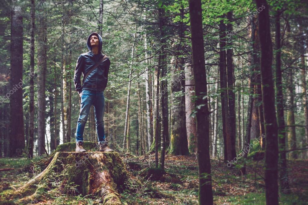 Confident man standing in the forest — Stock Photo © stockasso #88020894