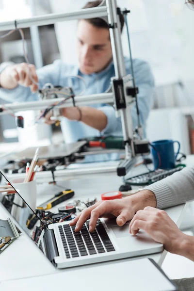 Engineering students working in the lab Stock Photo by ©stockasso 96585664
