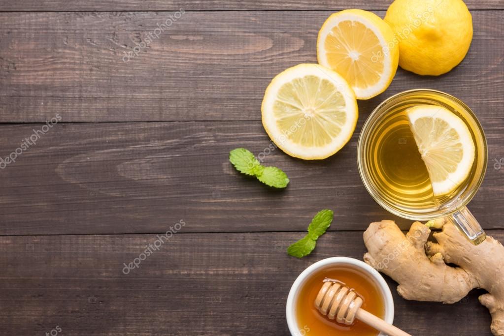 Cup of ginger tea with lemon and honey on wooden background Stock Photo ...