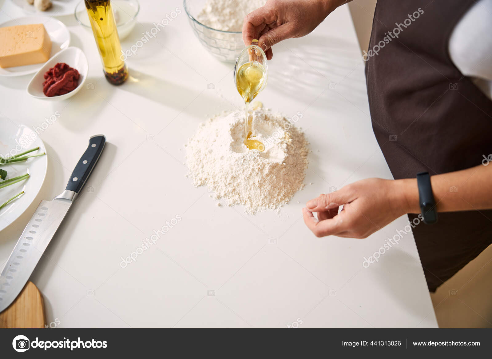 Chef adding olive oil while making dough — Stock Photo ...