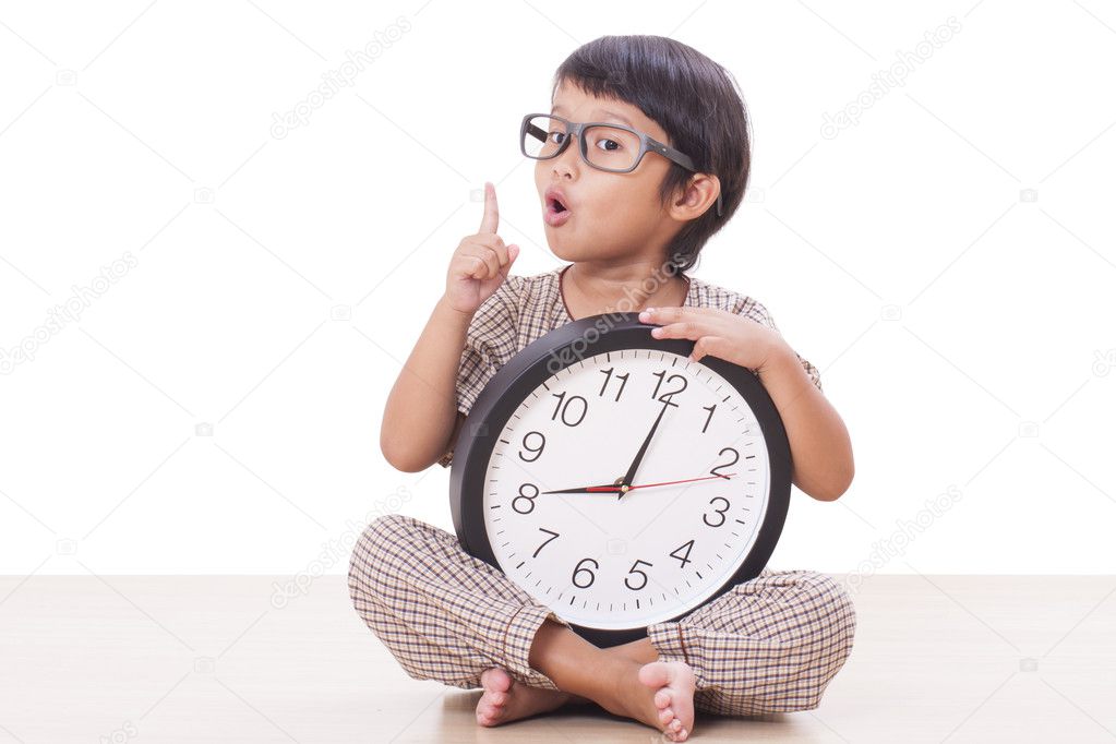 Cute boy is holding big clock i — Stock Photo © photousvp77 #55300911