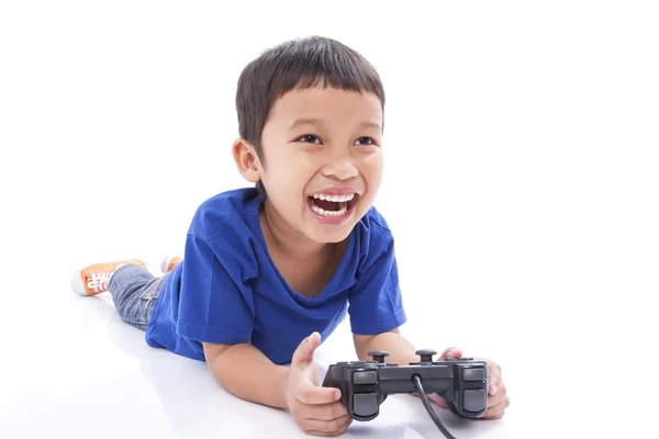 Boys playing video games — Stock Photo © verkoka #49960479