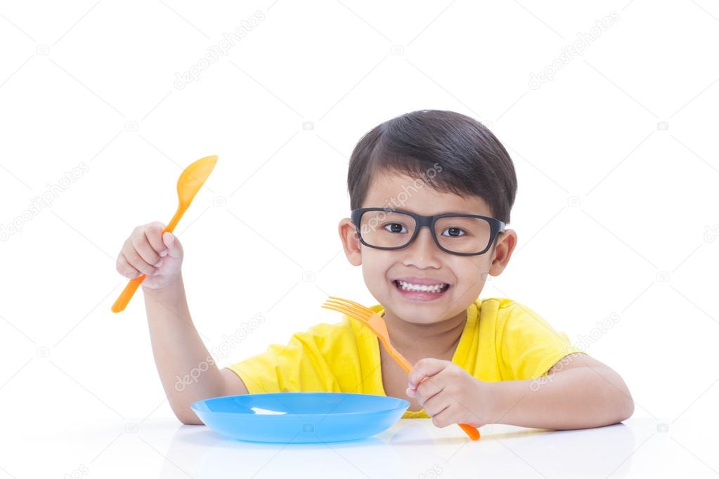 Little boy eating rice. Stock Photo by ©photousvp77 61017501