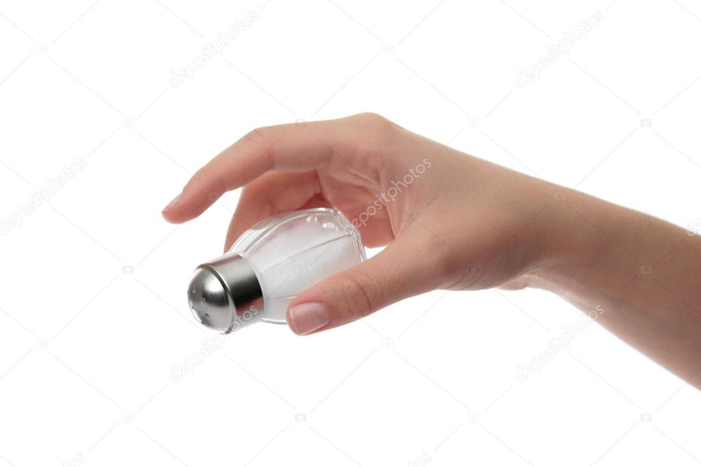 Mano sosteniendo un salero — Fotos de Stock © MichalLudwiczak #59357957