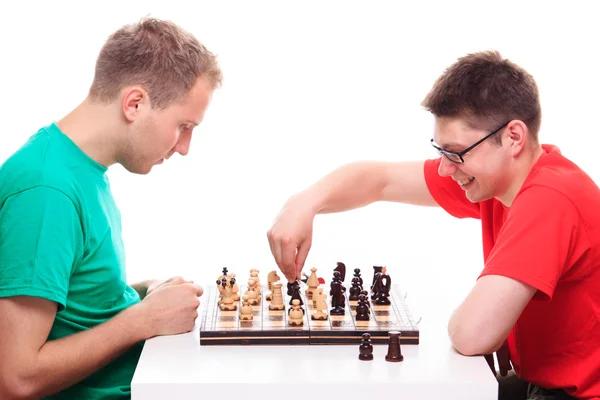 Two men playing chess Stock Photo by ©MichalLudwiczak 82348352