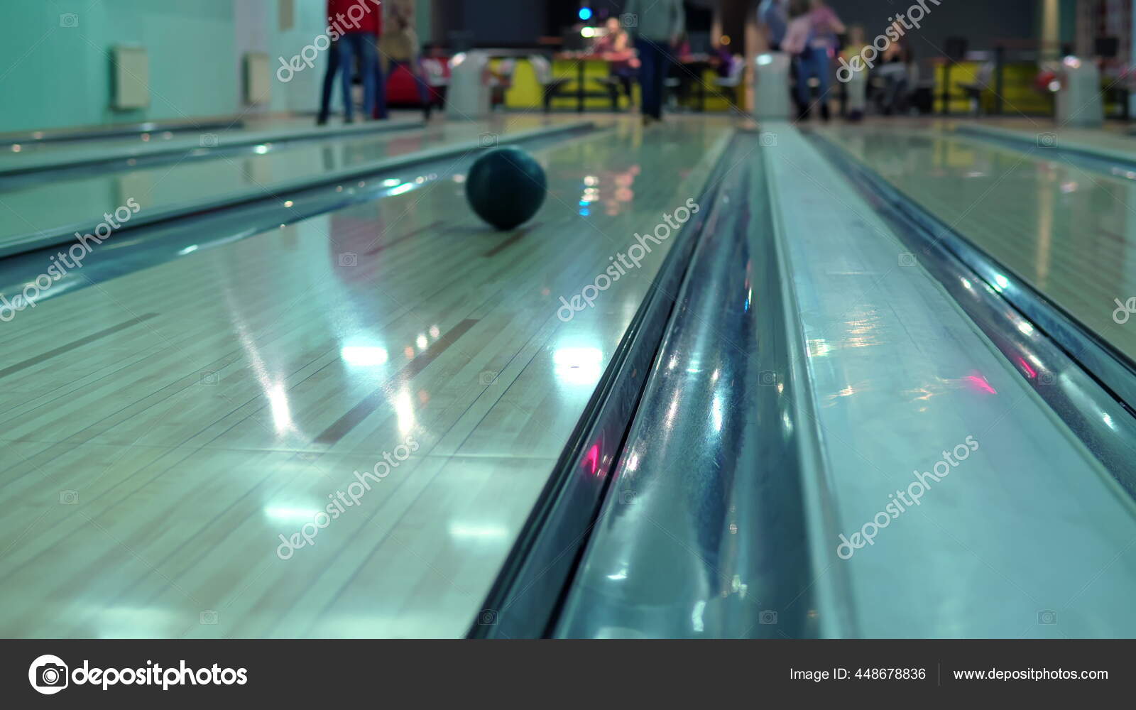 Bowling Ball Going Down Lane