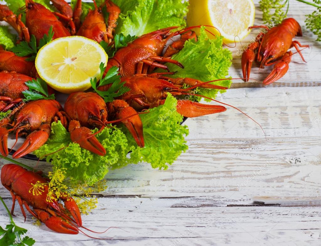 Crawfish on wooden background Stock Photo by ©OksanaYasiuchenia 81701978
