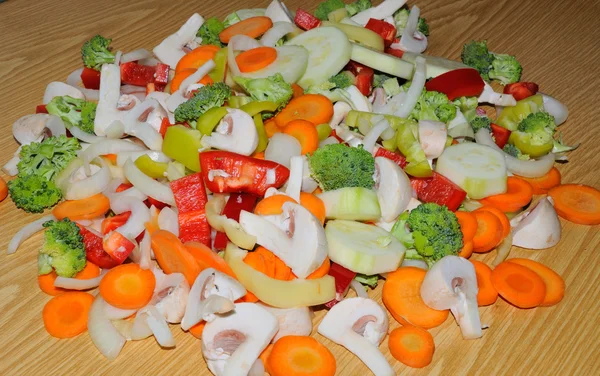 Miscellaneous fresh vegetables cut up in pieces ready for stir f ...