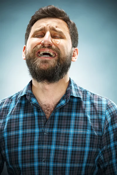 The crying man with tears on face closeup Stock Photo by ©vova130555 ...