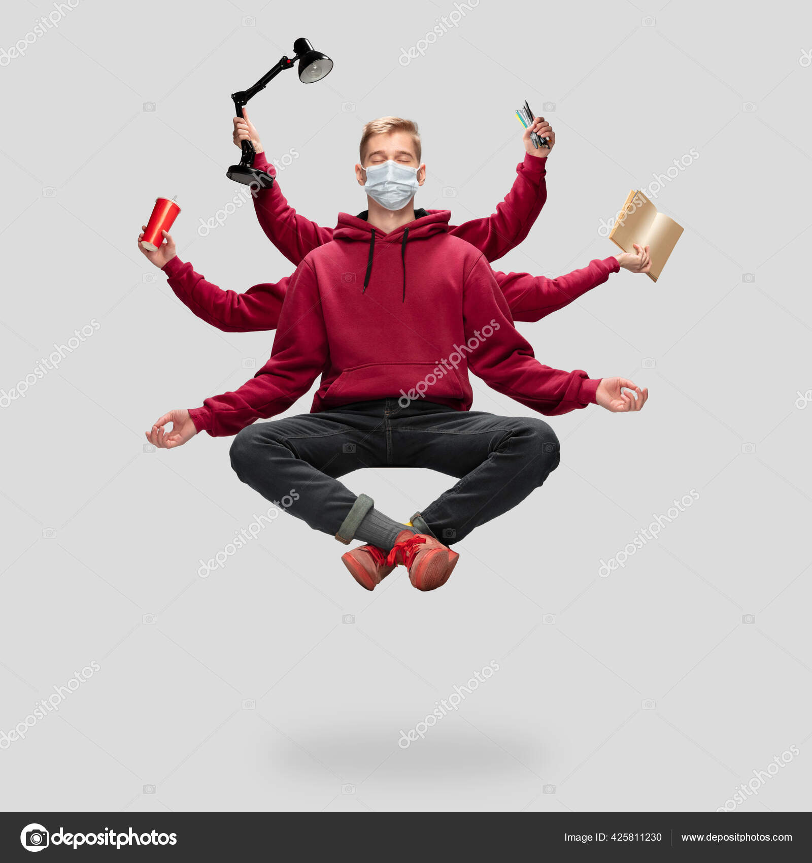 Handsome multi-armed student levitating isolated on grey studio ...