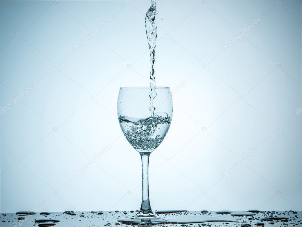 Glass being filled with water — Stock Photo © vova130555@gmail.com ...