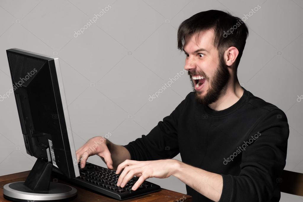 Funny and crazy man using a computer — Stock Photo © vova130555@gmail ...