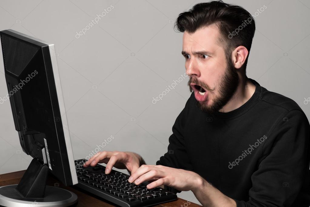 Funny and crazy man using a computer Stock Photo by ©vova130555@gmail ...