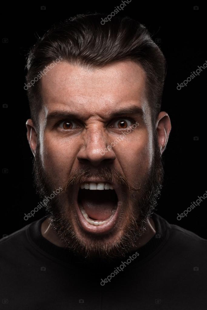 Portrait of young screaming man in studio Stock Photo by ©vova130555 ...