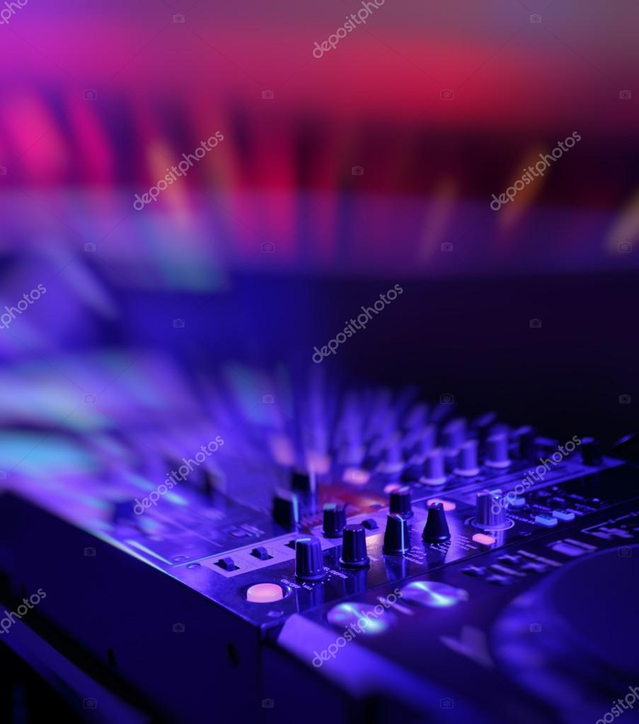 DJ mixer with light colored spotlights discos — Stock Photo © lyashik ...