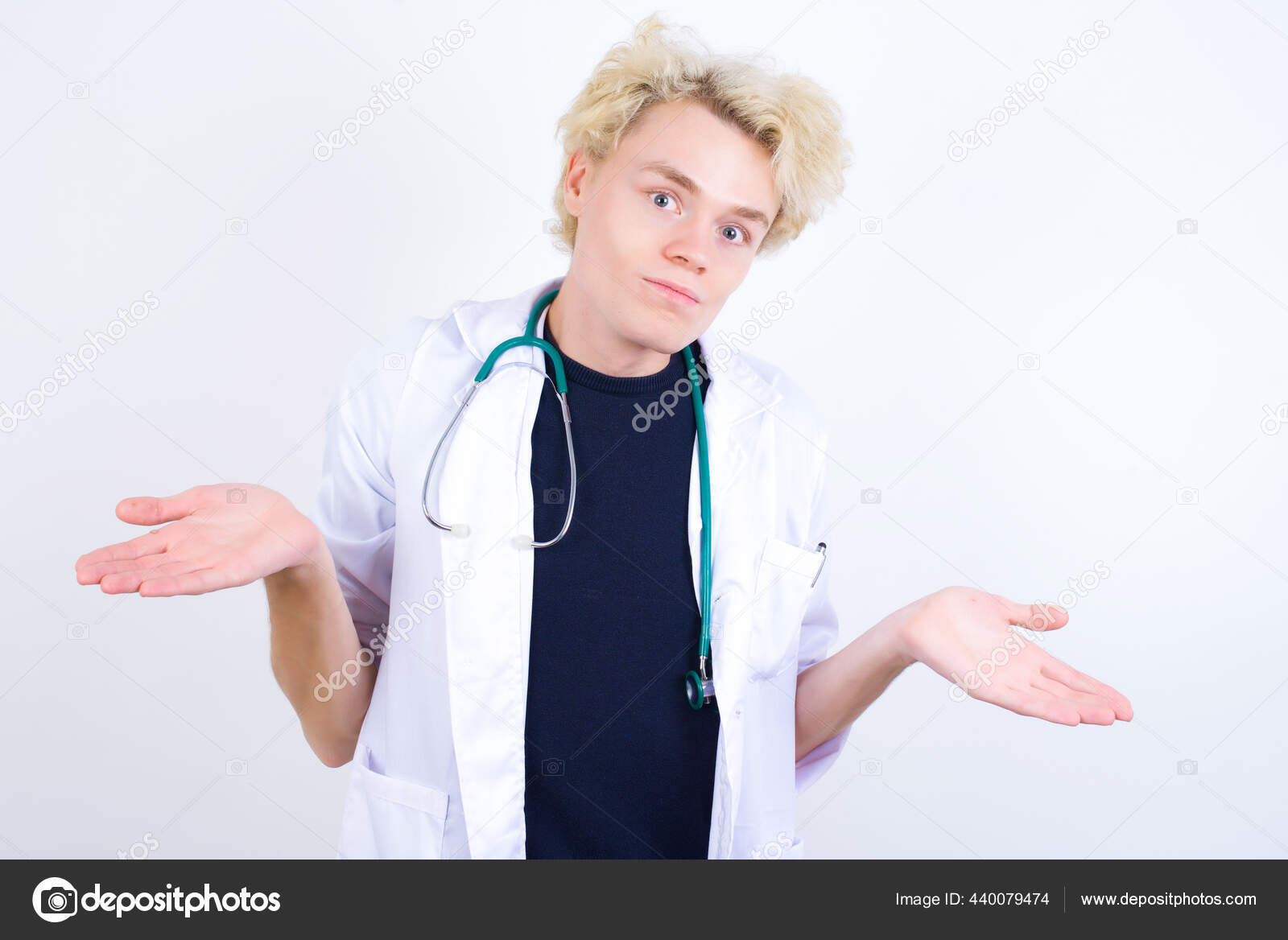 Puzzled Clueless Doctor Arms Out Shrugging Shoulders Saying Who Cares ...