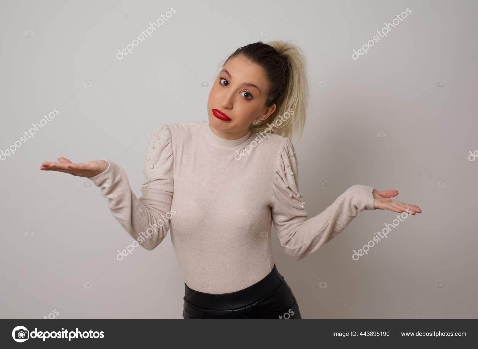 Puzzled Clueless Young Woman Arms Out Shrugging Her Shoulders Saying ...