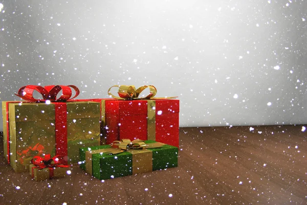 Christmas gift boxes in snow. Vector. — Stock Vector © almoond #60544063