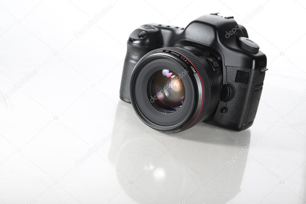 The camera on white background — Stock Photo © IvanVislov #63724157