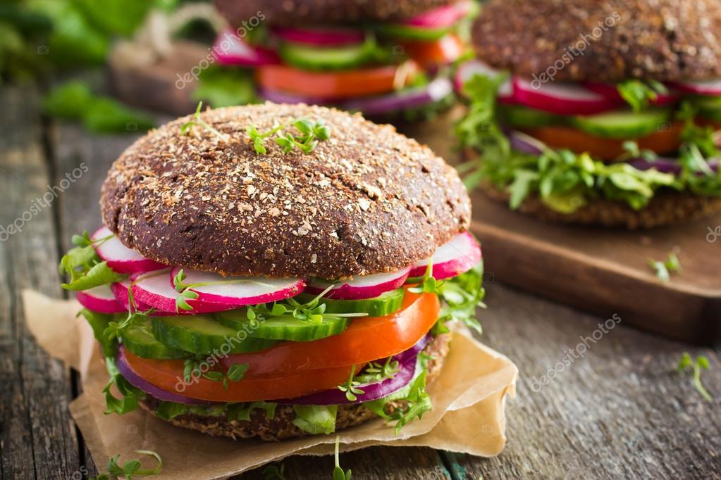 Vegan rye burger with vegetables Stock Photo by ©Anna_Shepulova 72651923