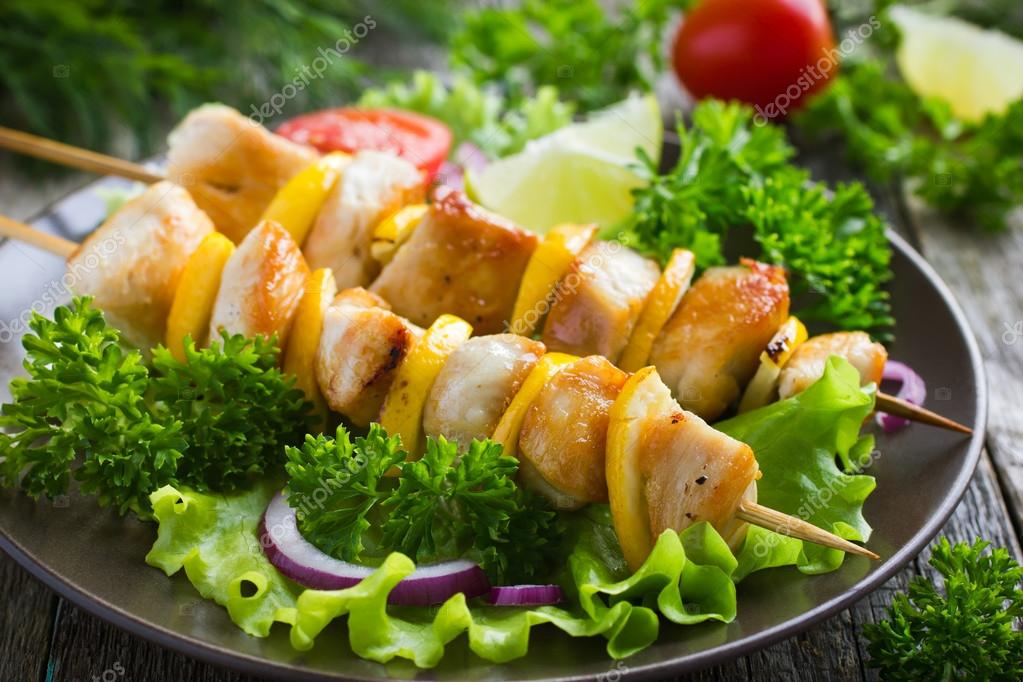 Grilled chicken and lemon kebab — Stock Photo © Anna_Shepulova #72669241