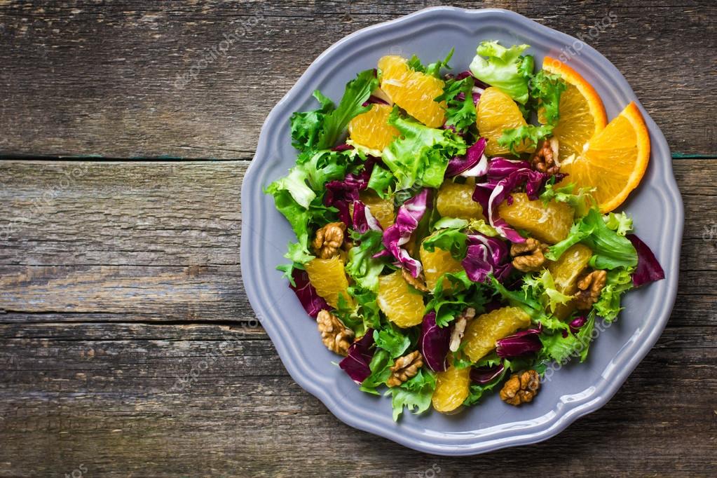 Salad mix with orange — Stock Photo © Anna_Shepulova #72678337