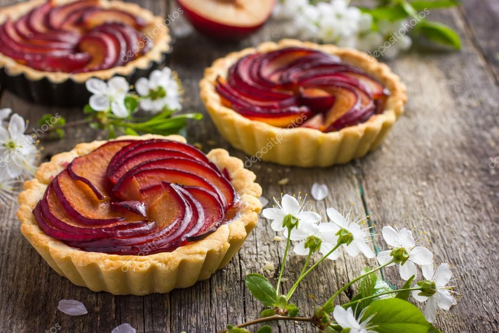 Sweet tartlets with plum Stock Photo by ©Anna_Shepulova 72689699