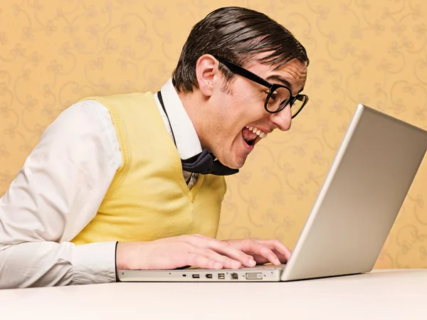 Young nerd sitting at the computer - Stock Image - Everypixel