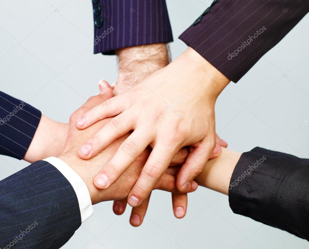Human hands in unity Stock Photo by ©nesharm 61112471