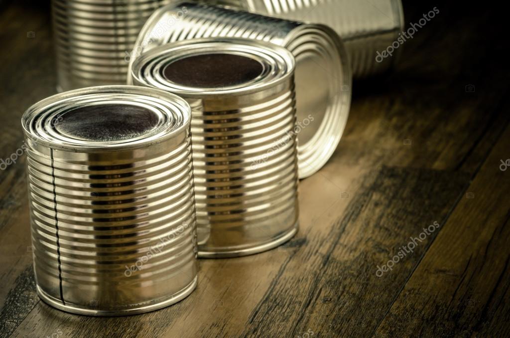 Tin cans for food on wooden background — Stock Photo © VICHAILAO #86594040