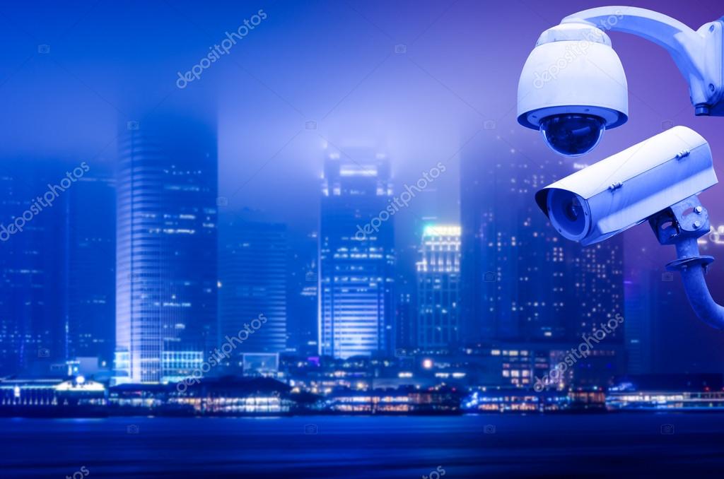 Surveillance Security Camera or CCTV over city — Stock Photo ...