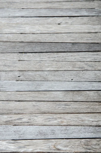 White wood table with green grass background — Stock Photo © kwanchaidp ...