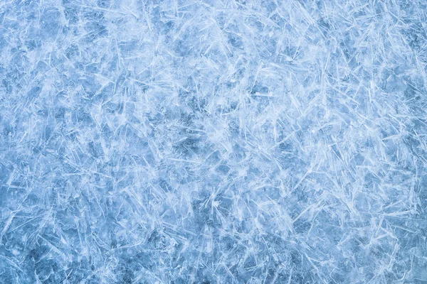 Cracked texture of ice. Blue ice surface with scratches. New year and ...