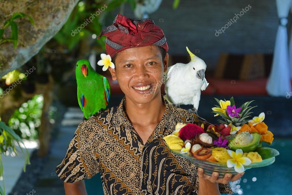 Asian waiter with a tray — Stock Photo © vision.si #58355153