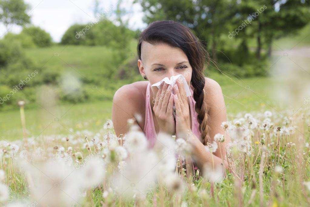Young woman suffering spring pollen allergy Stock Photo by ©Lopolo ...