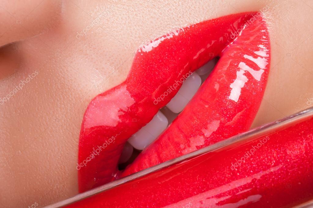 Red lips close-up. — Stock Photo © SergeyTay #83553190