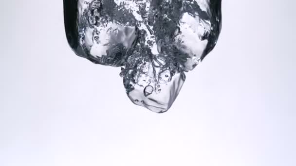 Ice cubes falling in water — Stock Video © soraphotography #60546985