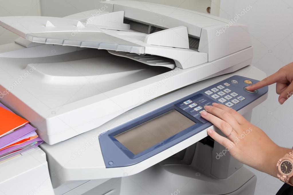 Human hand holding and start a purpose copier machine isolated Stock ...