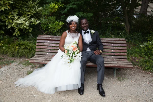 Bride and groom posing by a fountain — Stock Photo © jbryson #21360439