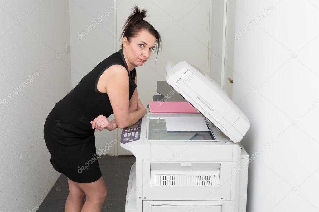 Woman and photocopy machine Stock Photo by ©OceanProd 65126003
