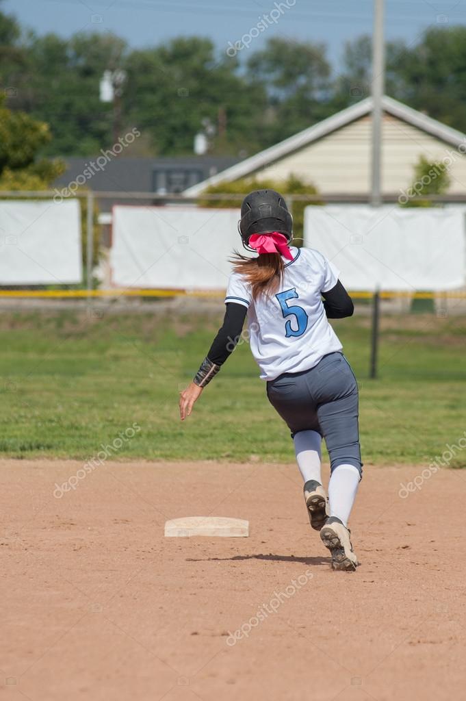 Base runner sprinting to second. — Stock Photo © motionshooter #108137938