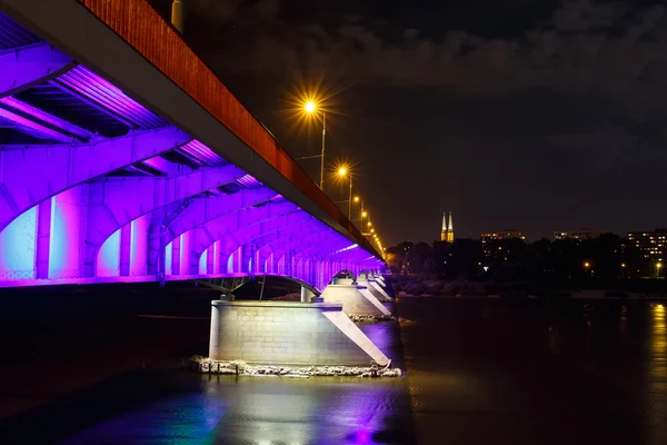 Night view of bridge and stadium in Warsaw — Stock Photo © castenoid ...