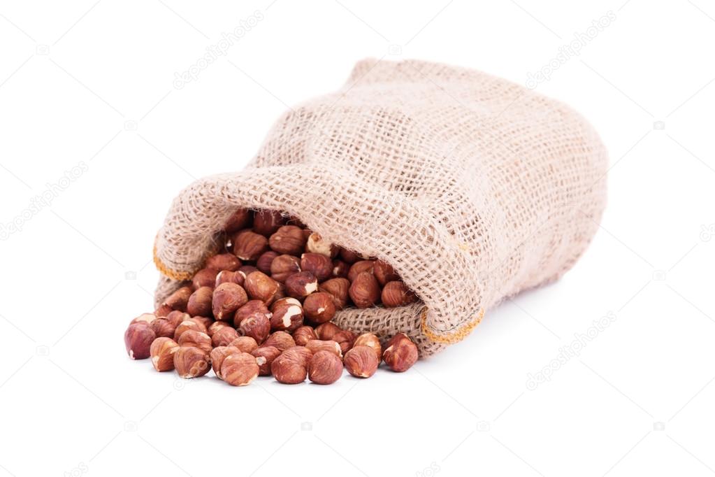 Spilled sack of hazelnuts Stock Photo by ©Mendelex 67492093