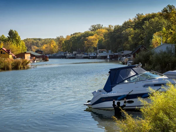 Launching a boat into a river Stock Photos, Royalty Free Launching a ...