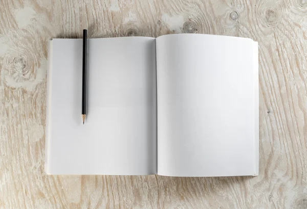 Brochure and pencil Stock Photo by ©Veresovich 154774418