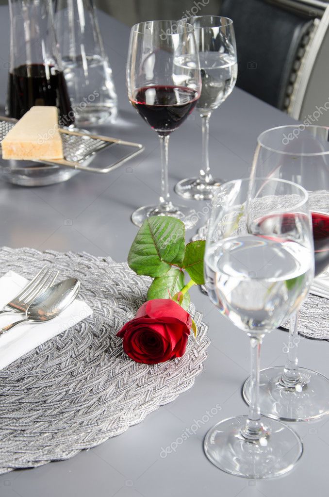 Dinner table with rose Stock Photo by ©JHRSPhotos 60129385
