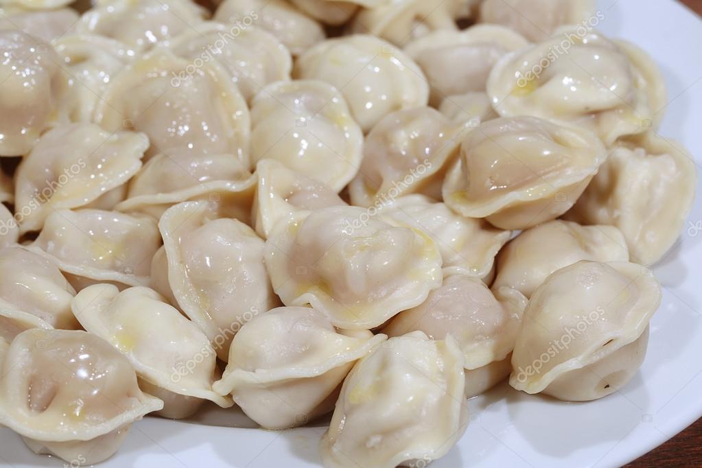 Pelmeni with butter — Stock Photo © DmZo #63282783